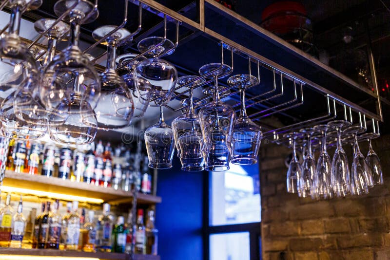 Rows of Empty Wine Glasses on the Bar Counter in the Restaurant or Bar ...