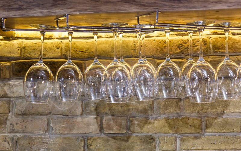 Rows of Empty Wine Glasses on the Bar Counter in the Restaurant or Bar ...