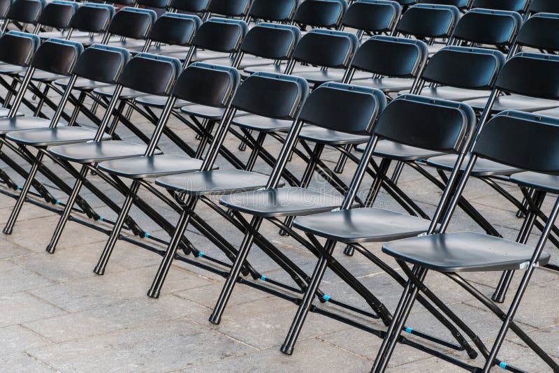 Many Empty Black Folding Chair Rows Stock Photos - Free & Royalty-Free ...
