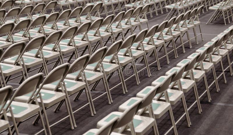 Rows of Folding Chairs stock image. Image of bench, indoor - 11018127