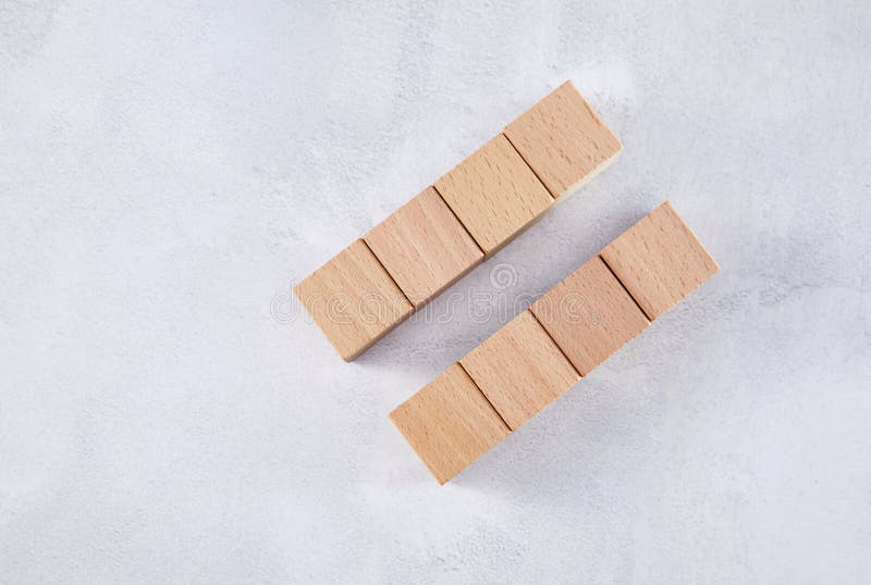 Rows of Four Blank Wooden Blocks on a Light Blue Background Stock Image ...