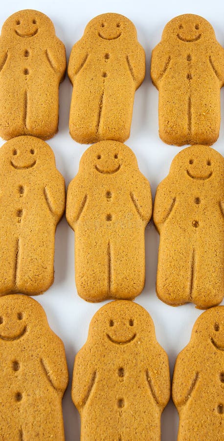Row of Smiling Gingerbread Men Stock Photo - Image of bread, goods ...