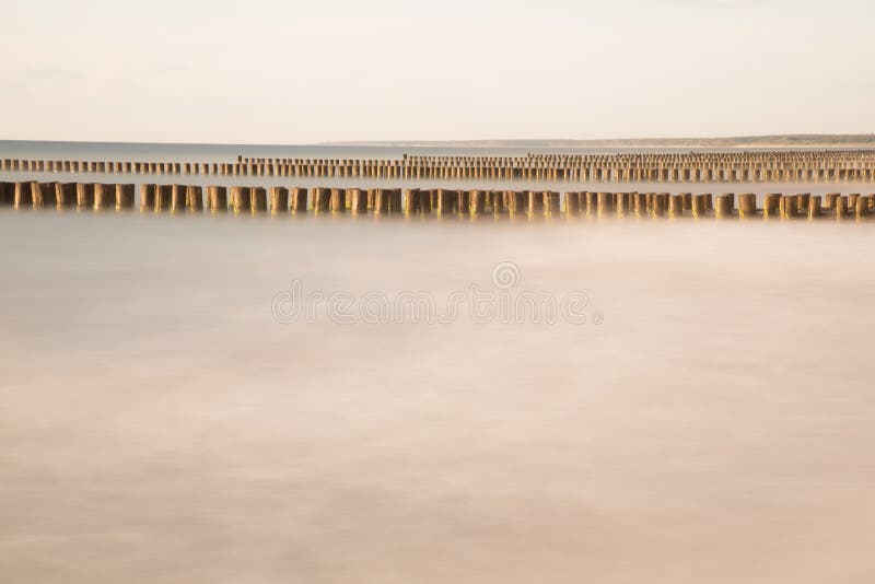 Rows of Groynes in the Calm Baltic Sea Stock Photo - Image of ...