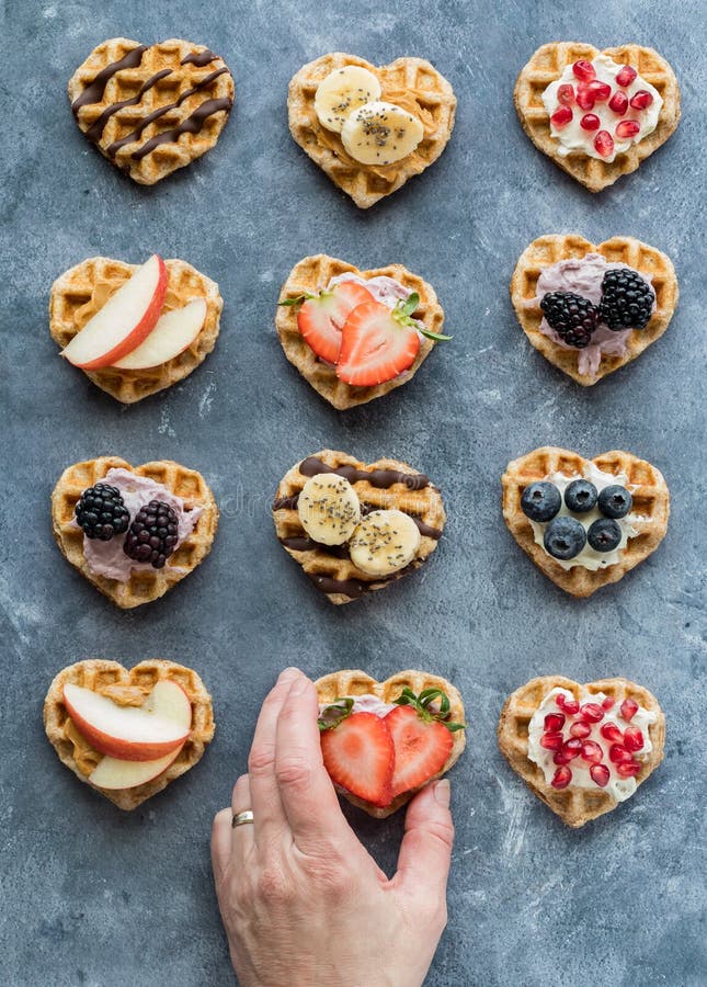 Rows of Heart Shaped Mini Waffles with Various Toppings, Ready for ...