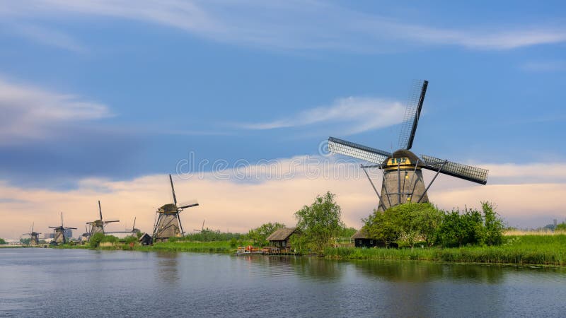 Rows of Historic Wind Mills at UNESCO World Heritage Site Kinderdijk in ...