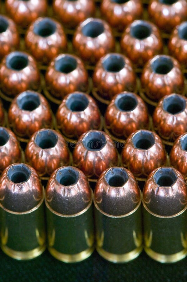 A Hand Full of Bullets - Ammunition Stock Photo - Image of hollowpoint ...
