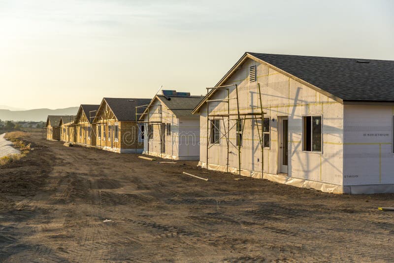 Rows of Houses Under Construction with Scaffolding Along the Sides ...