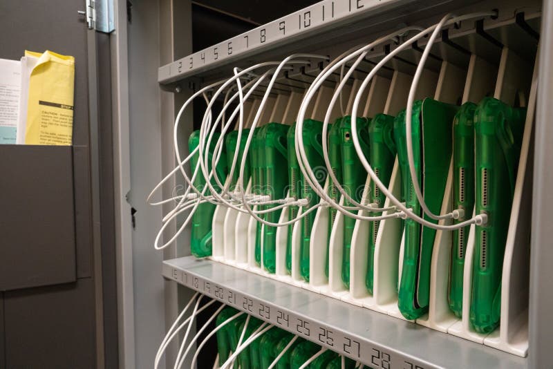 Rows of IPad Tablets Charging in Storage Case for Grade School ...
