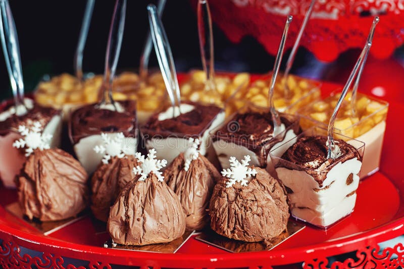 Rows of Italian Mignon Cakes on a Red Stand Stock Image - Image of ...