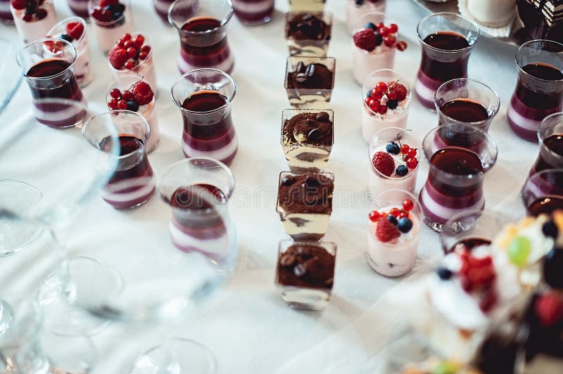 Rows of Italian Mignon Cakes on a White Cloth Stock Image - Image of ...