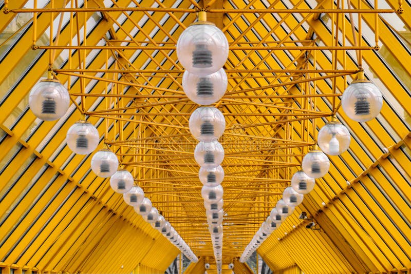 Rows of Lamps Made from Colanders with Glowing Glass Bulbs Inside ...