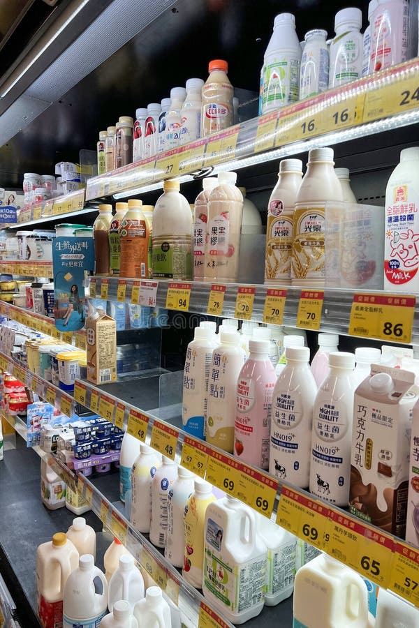Rows of Large Milk Bottles in the Long Open Fridge Editorial Stock ...