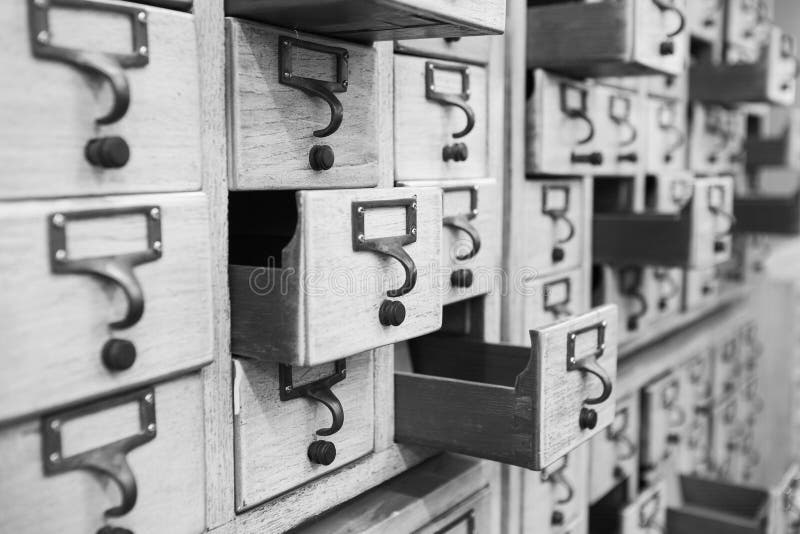 Rows of Little Drawers with White Empty Tags in an Old Furniture Module ...
