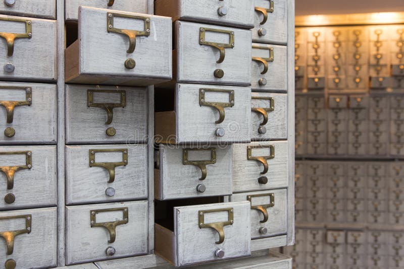 Rows of Little Drawers with White Empty Tags in an Old Furniture Module ...