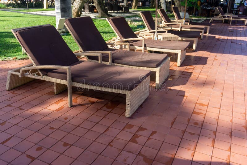 Rows of Lounge Chairs by the Pool Stock Image - Image of outdoor, deck ...