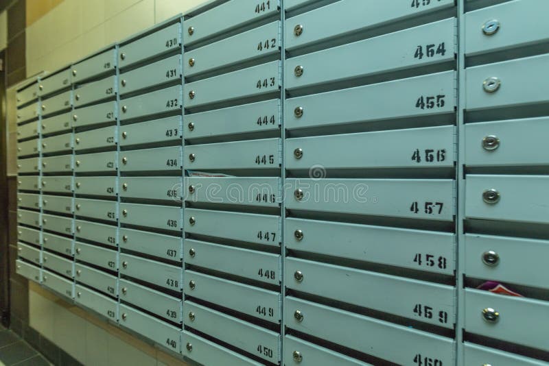Rows of metal mailboxes stock photo. Image of house - 120306142