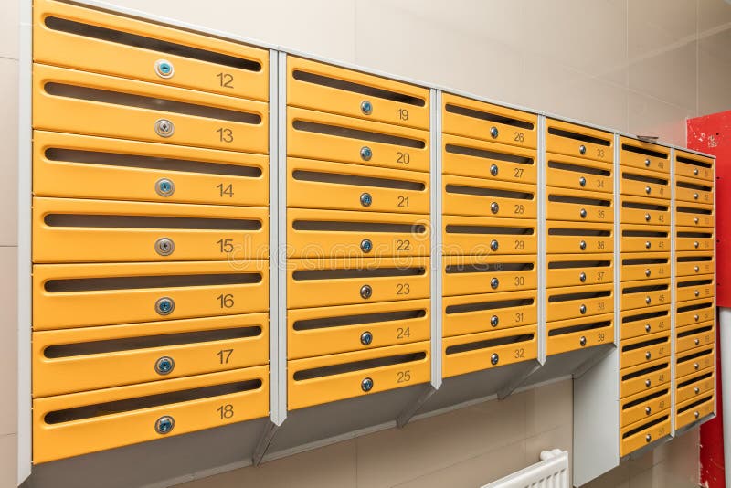 Rows of metal mailboxes stock image. Image of corridor - 113987255