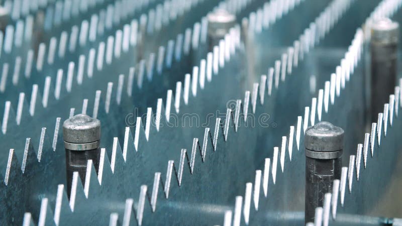 Rows of Metal Plates with Sharp Edges in Machine Tool. Manufacturing ...