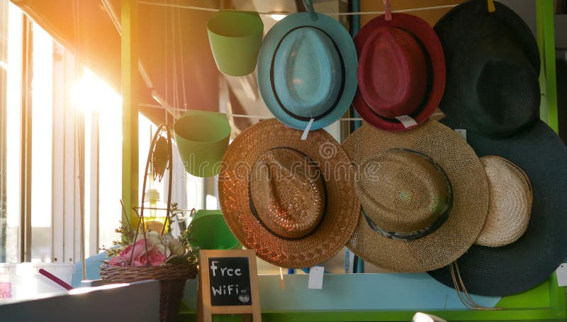 Rows of Multi-colored Straw Hats for Sale on Shelves in a Market Stock ...