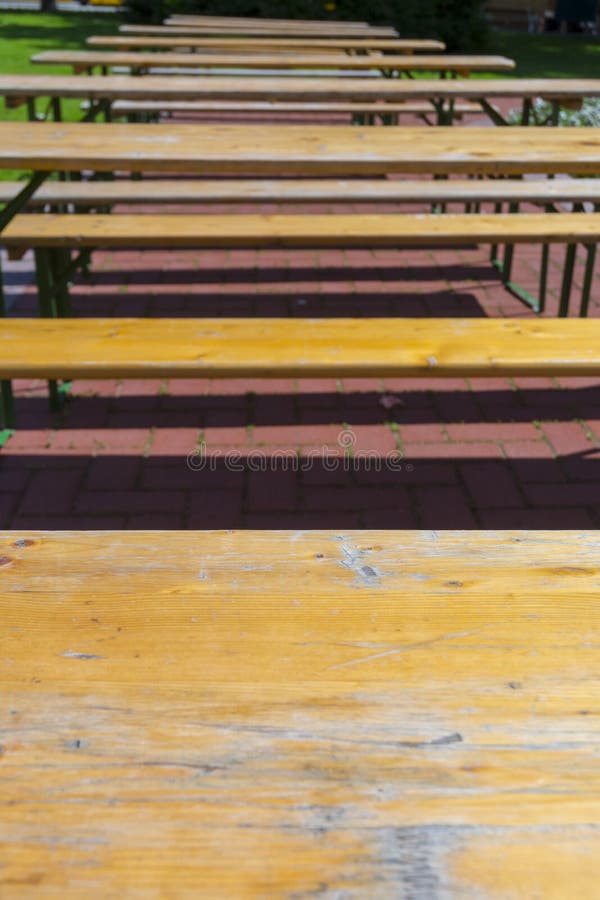 Rows of Outdoor Wooden Benches on a Sunny Day Stock Photo - Image of ...