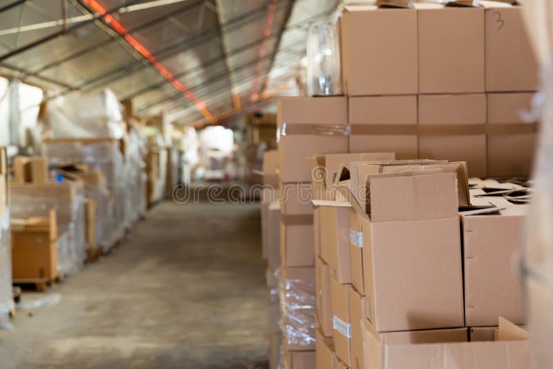 Rows of Pasteboard Boxes on Racks in Storehouse Stock Image - Image of ...