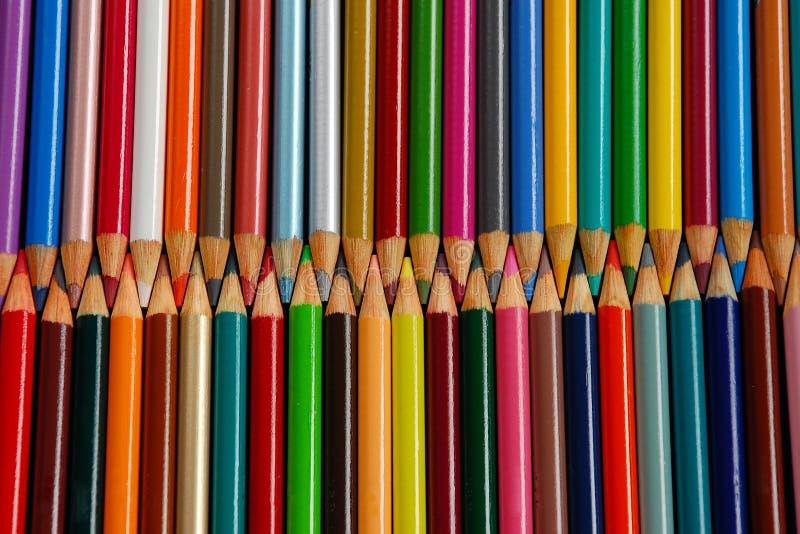 Rows of pencil crayons stock image. Image of crayon, school - 34733757