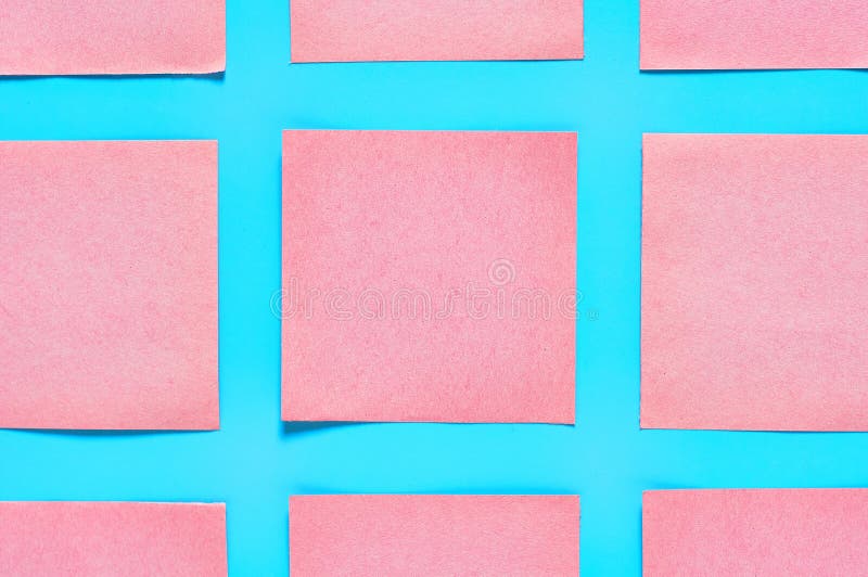 Rows of Pink Square Blank Paper Stickers on Blue Background. Copy Space ...