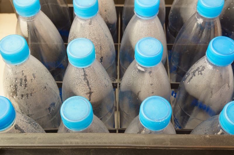 Rows of Plastic Water Bottles Stock Photo - Image of bottles, water ...