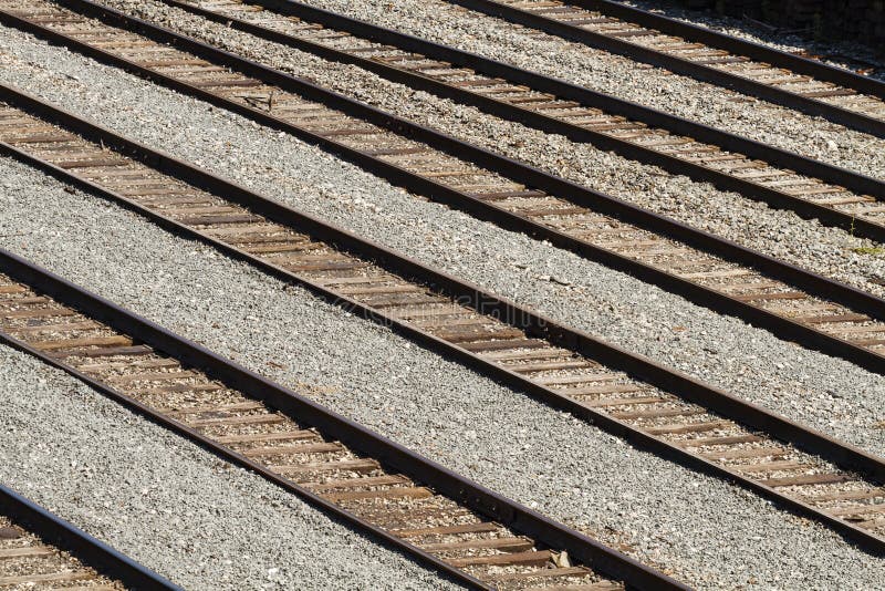 Rows of Railroad Tracks in a Train Yard Stock Photo - Image of orange ...