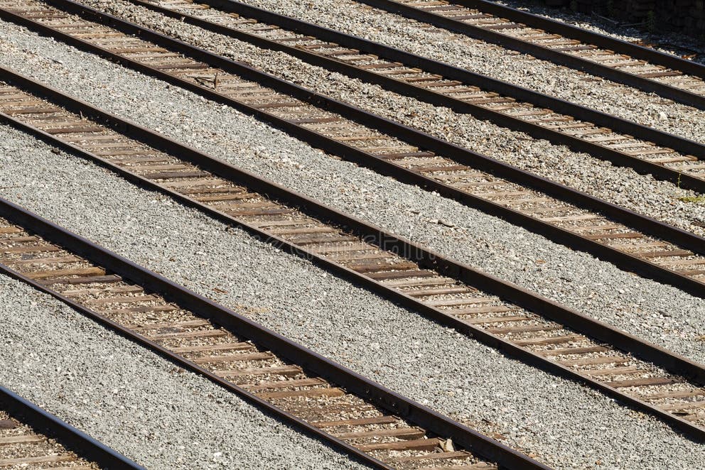 Rows of Railroad Tracks in a Train Yard Stock Photo - Image of orange ...