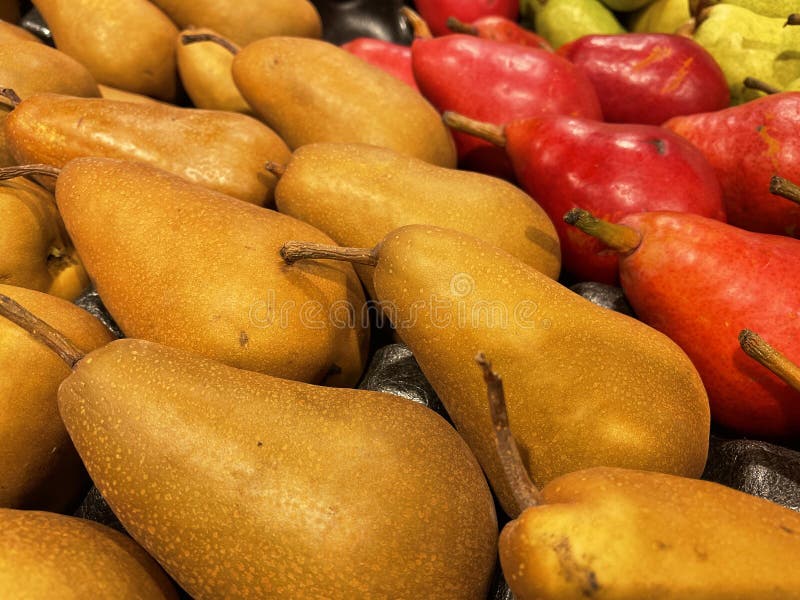 Rows of Red and Brown Pears on Display Stock Image - Image of ripe ...