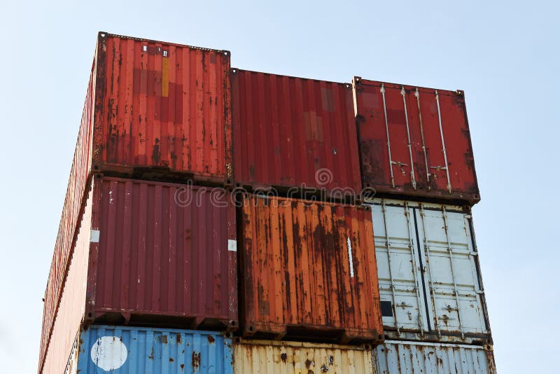 Rows of Rusty Shipping Containers on the Background of Blue Sky Stock ...