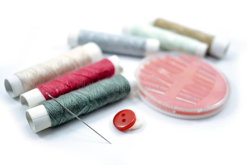 Rows of Sewing Threads of Various Colors, Sewing Needles and Shirt ...
