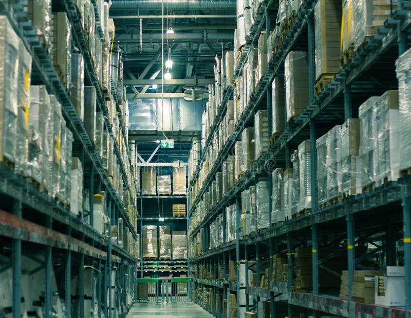 Rows of Shelves with Boxes in Modern Large-scale Warehouse Stock Photo ...