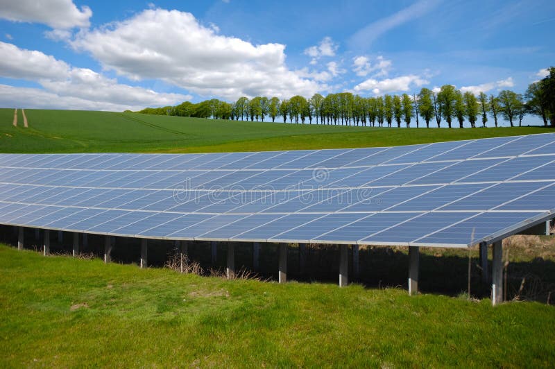 Rows of Solar Panels and Green Nature Stock Image - Image of ...