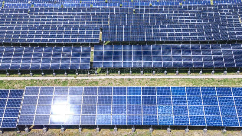 Rows of Solar Panels on a Hot Day Stock Photo - Image of equipment ...