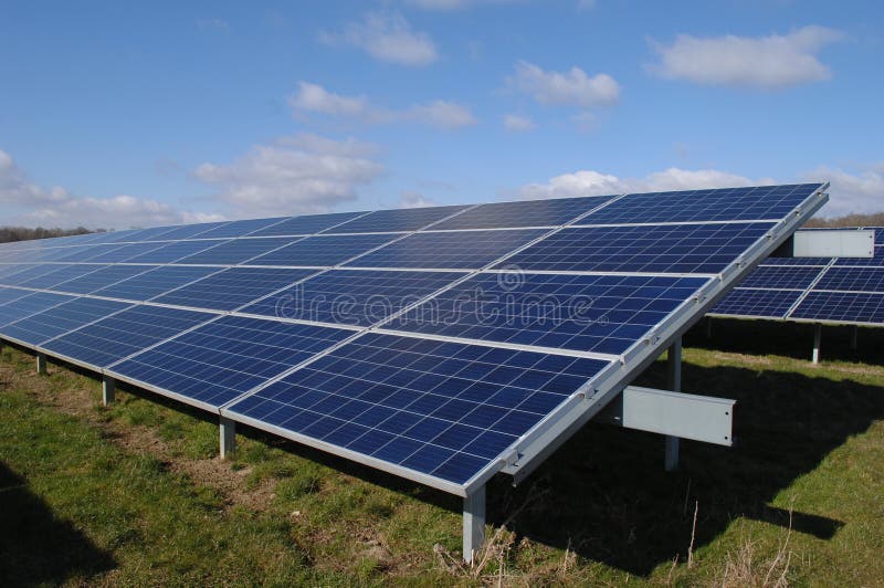 Rows of solar panels stock photo. Image of industrial - 249803284