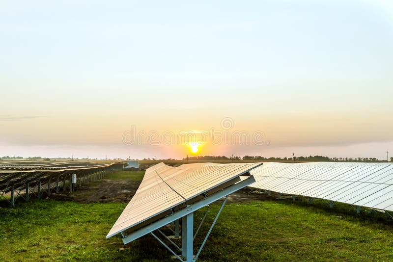Rows of Solar Panels on Sunset Background Stock Photo - Image of ...