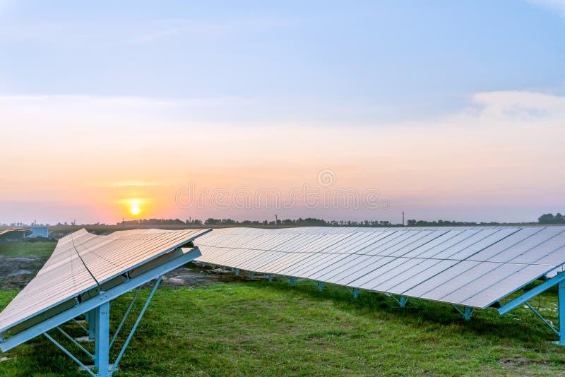 Rows of Solar Panels on Sunset Background Stock Image - Image of ...