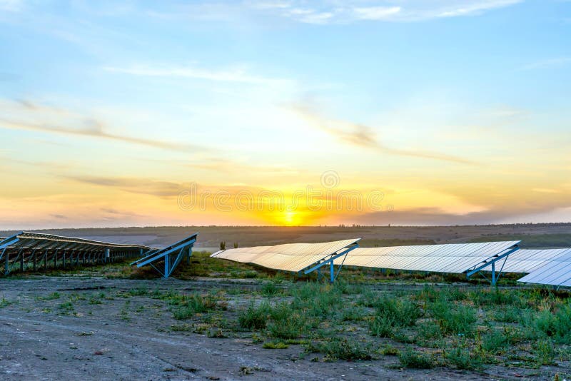 Rows of Solar Panels on Sunset Background Stock Photo - Image of ...