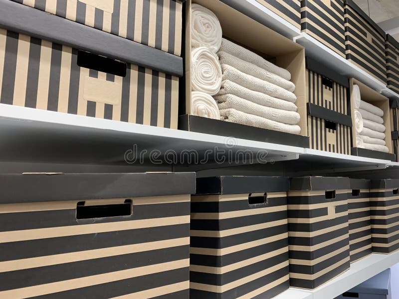 Rows of Stacked Storage Carton Boxes and Home Textyle Stacked on ...