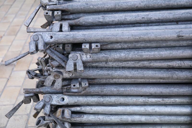 Rows of Steel Bar Storage and Stacking in the Warehouse for Industrial ...