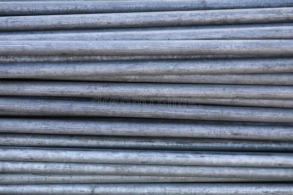 Rows of Steel Bar Storage and Stacking in the Warehouse for Industrial ...