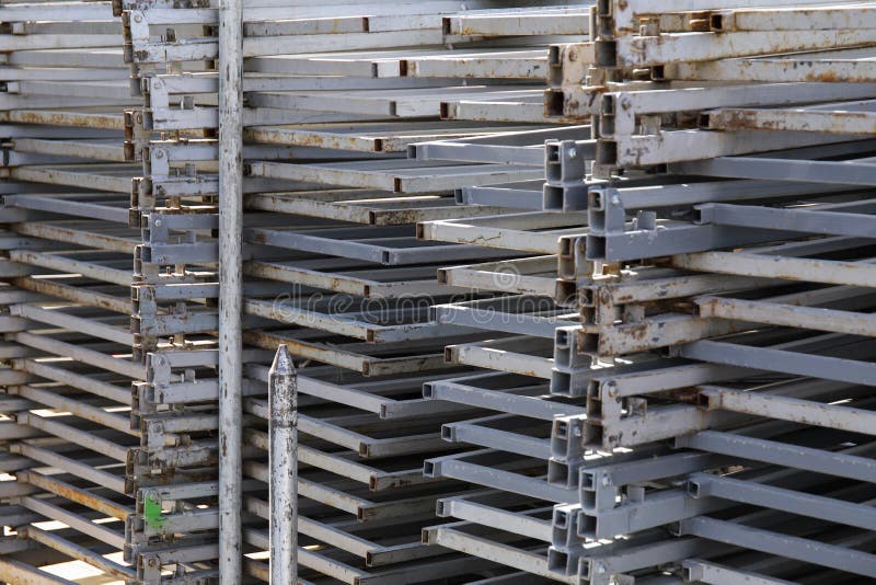 Rows of Steel Bar Storage and Stacking in the Warehouse for Industrial ...