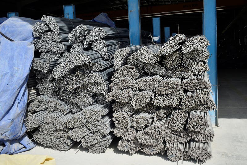 Rows of Steel Rod Storage and Stacking in the Warehouse for Industrial ...