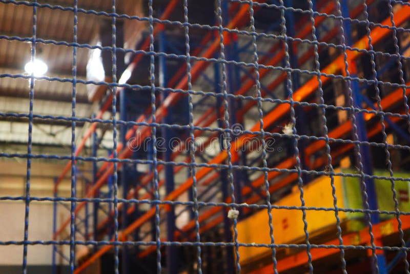 Rows of Storage Shelves with Boxes and Equipment in Factory Warehouse ...