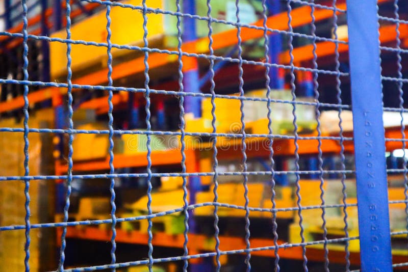 Rows of Storage Shelves with Boxes and Equipment in Factory Warehouse ...