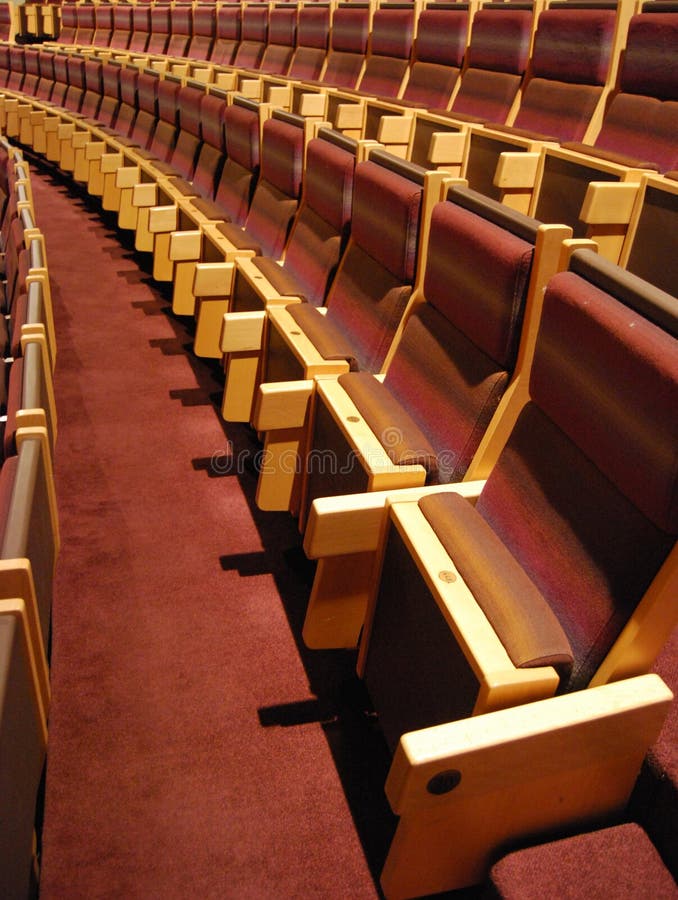 Rows of theater seats stock image. Image of empty, light - 6856693