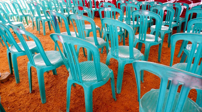 Rows of Turquoise Blue Plastic Chairs Stock Image - Image of leisure ...