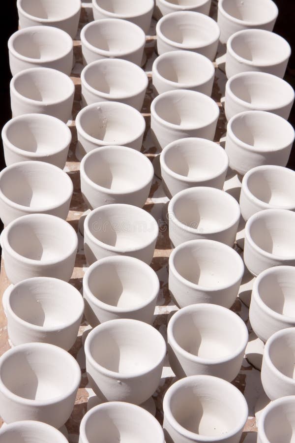 Rows of White Cups from Clay Stock Image - Image of glass, small: 28863123